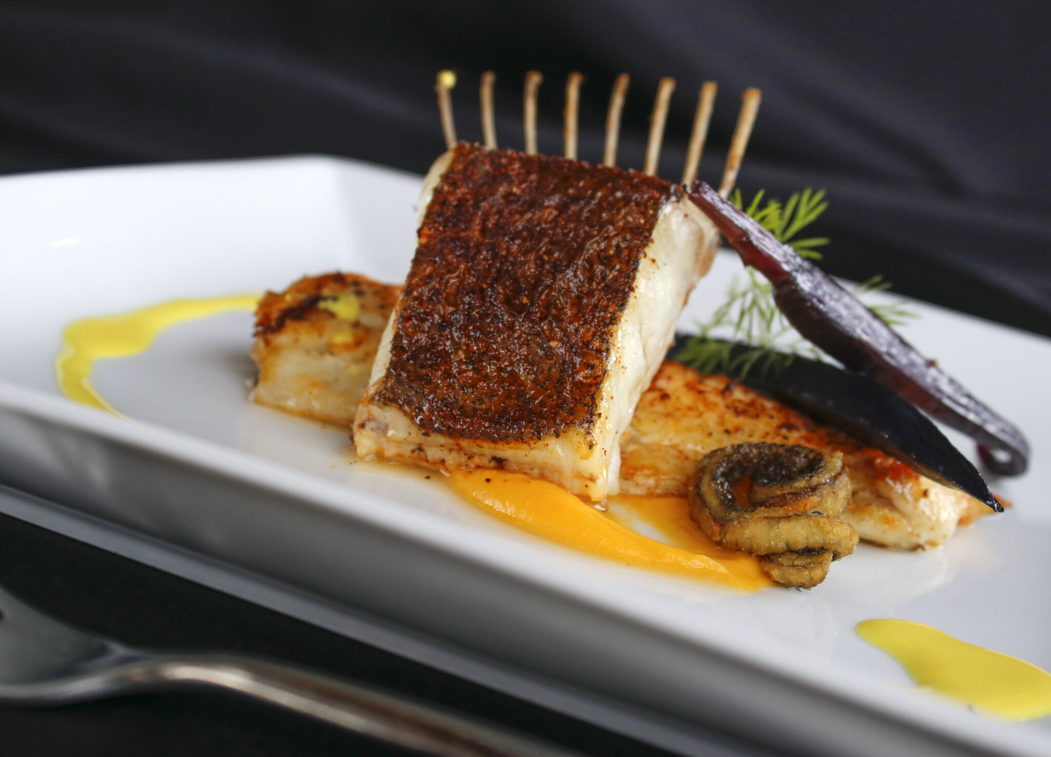 This Frenched and Harissa-Spiced Flounder Rack Features Sweet Potato ...